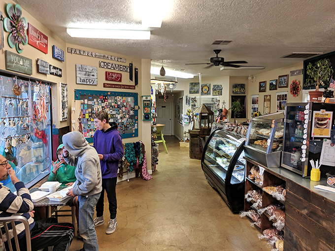 Inside Muddy Bees, every wall tells a story. The community bulletin board serves as Hurricane's analog social network, connecting locals one pastry at a time.