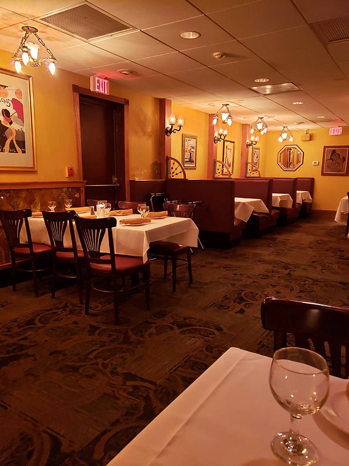 Golden walls, white tablecloths, and warm lighting create that rare atmosphere where you instantly know you're in for something special.