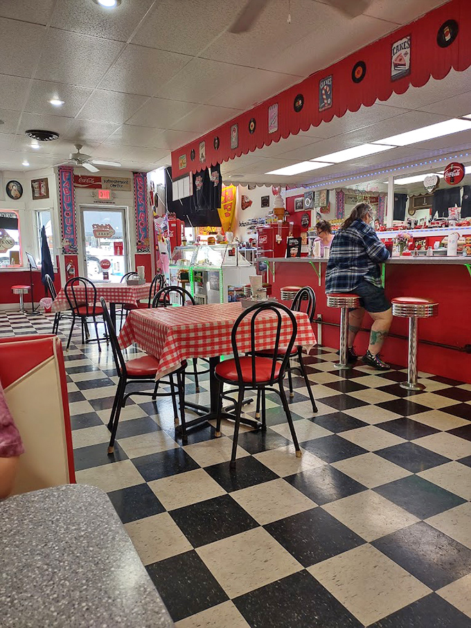 Black and white checkered floors, red gingham tablecloths, and chrome stools&mdash;this isn't retro-inspired, folks, it's retro-preserved.