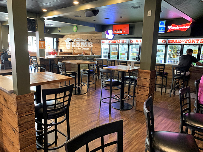 Inside, rustic wood meets modern comfort in a space that invites you to linger over your meal rather than rush back to reality.