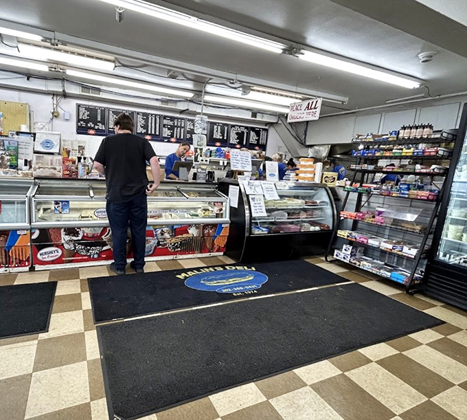 Inside Malin's, the checkerboard floor leads to sandwich nirvana. This isn't trendy minimalism&mdash;it's the authentic deli experience we all crave.