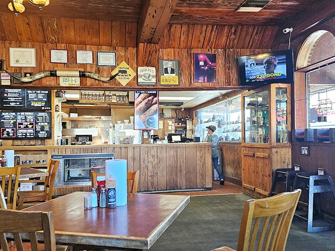 Wood-paneled walls tell stories of barbecue past while the counter awaits your order. This isn't d&eacute;cor&mdash;it's a barbecue time machine.