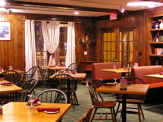 Wood-paneled walls and Windsor chairs create that rare atmosphere where comfort meets class&mdash;no white tablecloths required for exceptional dining.