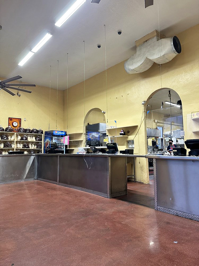 No-frills yellow walls and simple counter service tell you immediately: El Modelo isn't about Instagram aesthetics—it's about flavors that will haunt your dreams.