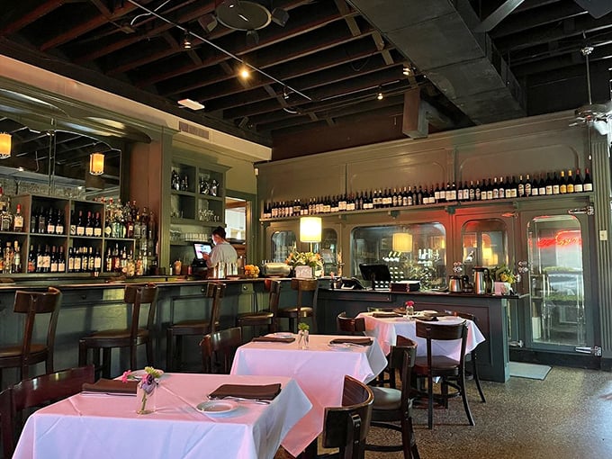 White tablecloths meet exposed beams in this former flower shop. The bar's impressive wine collection suggests they take their pairings as seriously as their proteins.