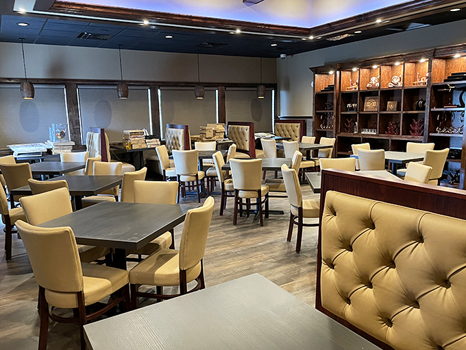 Cream-colored chairs and tufted booths create an atmosphere that's both elegant and approachable&mdash;like your fancy friend who still laughs at dad jokes.