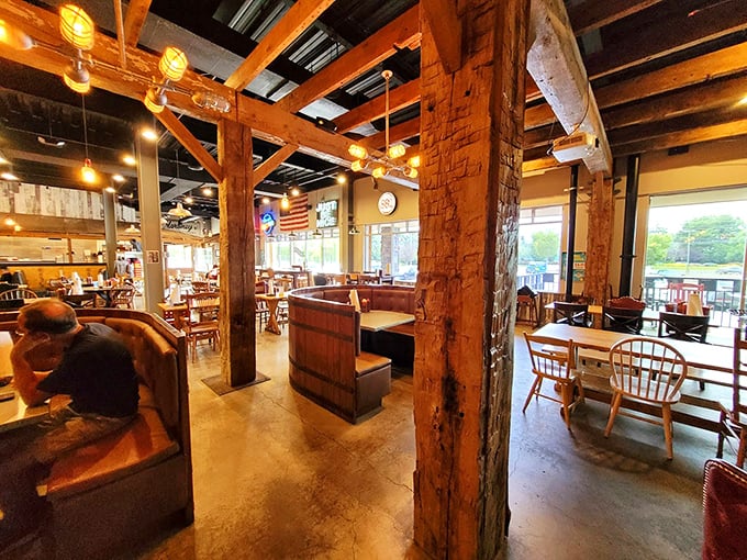 Exposed beams, barrel-inspired booths, and warm lighting create that rare atmosphere where you instantly know you're in for something special.