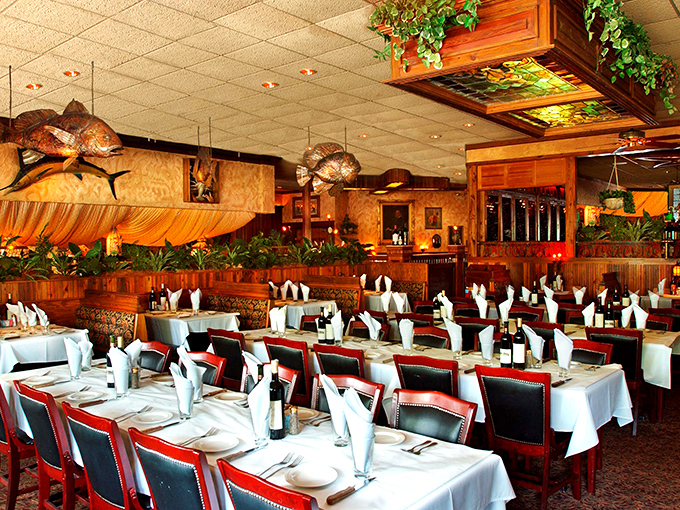 Old-school elegance meets Florida flair. White tablecloths, mounted fish trophies, and warm wood tones create the perfect backdrop for serious meat consumption.
