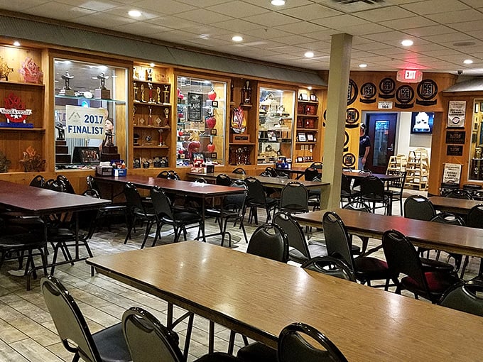 Trophy cases line the walls like a BBQ hall of fame, silently testifying that this no-frills joint has serious competition credentials.