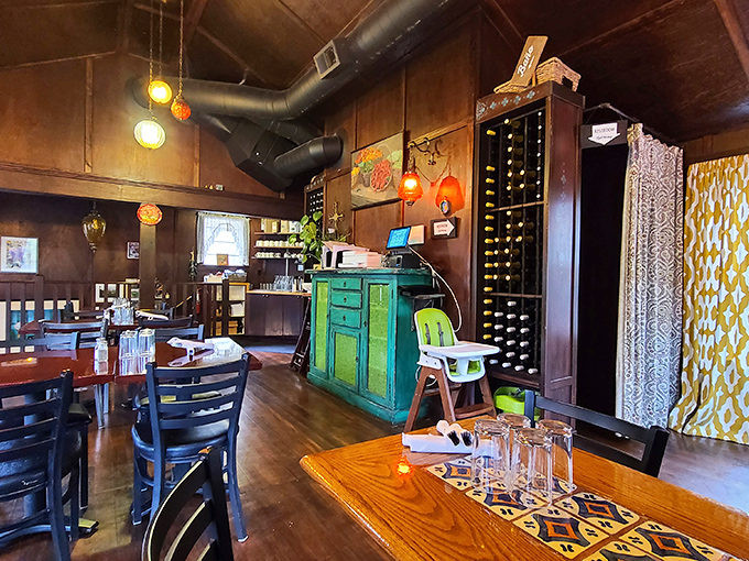 Inside, the warm wooden interior feels like the dining room of a stylish friend who somehow makes vintage and modern coexist perfectly. That turquoise host stand? Pure Portland charm.