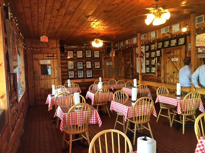 Step inside to a wood-paneled sanctuary where checkered tablecloths and decades of awards tell you this isn't their first rodeo at the smoker.