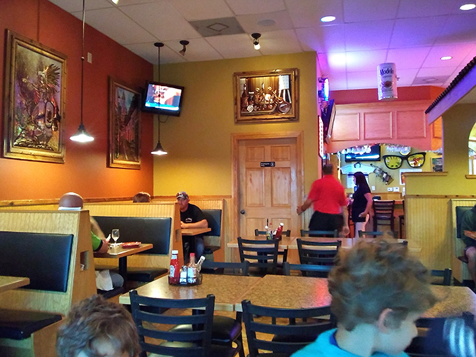 Warm terra cotta walls and cozy booths create the perfect backdrop for culinary magic. Feels like someone's abuela is cooking in the back.