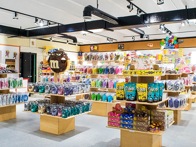 Candy geography lesson: islands of sweetness in a sea of possibility, with that giant M&M mascot standing guard over the treasure.