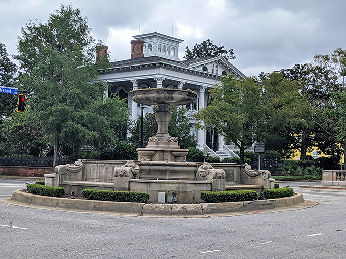 This elegant fountain stands as the centerpiece of Kenan Plaza, where locals gather to escape the Carolina heat and admire antebellum beauty.