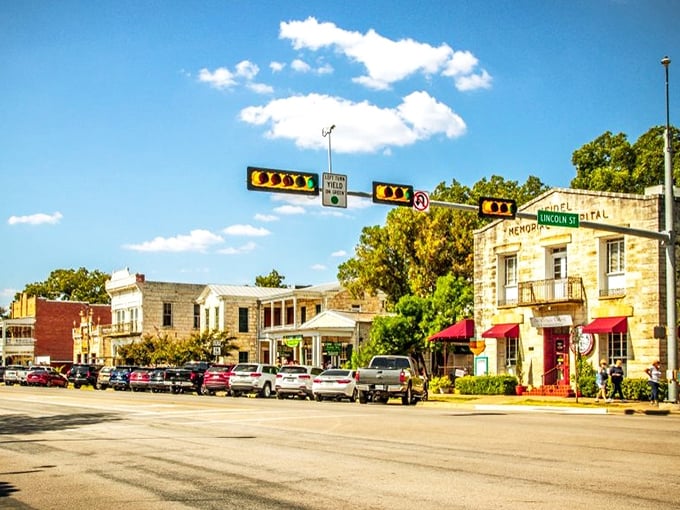 Historic limestone buildings stand shoulder to shoulder along Main Street, offering a glimpse into Fredericksburg's 19th-century German roots while housing modern boutiques.
