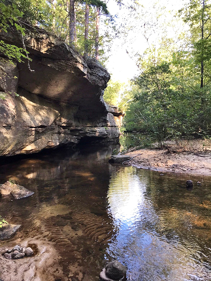 Nature's architecture at Pickle Springs Natural Area rivals the town's historic buildings. Crystal-clear waters reflect the ancient sandstone formations that frame this serene spot.