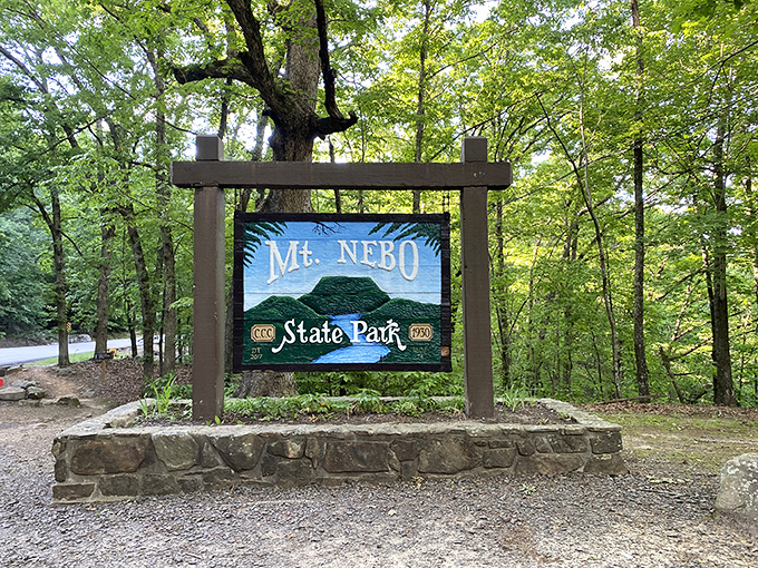 The gateway to adventure stands tall among the trees, promising memories more lasting than that summer camp friendship bracelet you still keep in a drawer.
