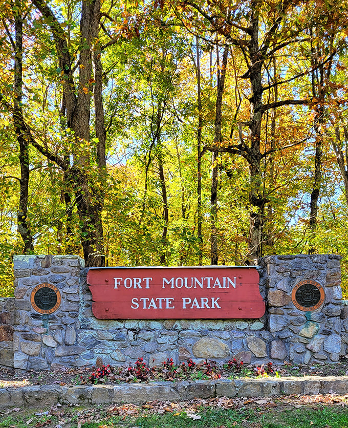 This entrance sign doesn't just mark a boundary&mdash;it's nature's version of "you are now entering the good stuff." Fall foliage provides the perfect backdrop.