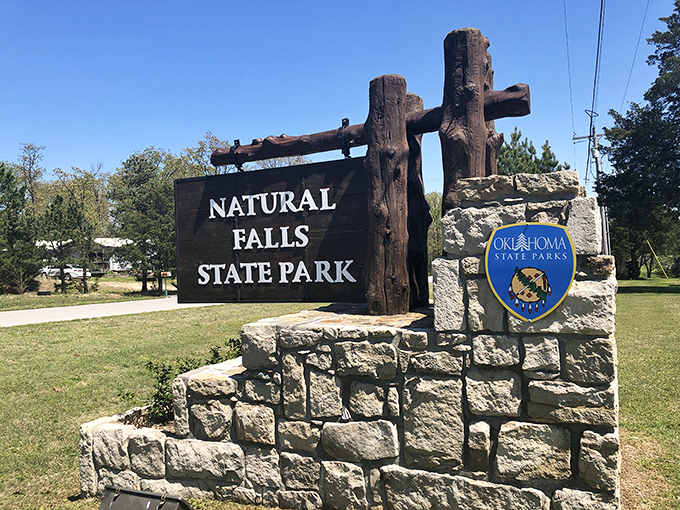 Welcome to paradise! The rustic entrance sign marks your departure from everyday Oklahoma and your entrance into a hidden geological wonderland.