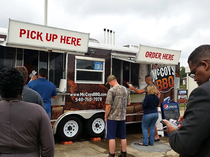 The universal language of barbecue: a line of pilgrims waiting patiently for their smoky salvation on an ordinary Tuesday.