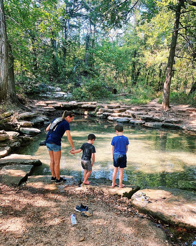 Family adventures begin at the water's edge, where natural stone pools invite curious explorers to dip their toes into Oklahoma's liquid history.