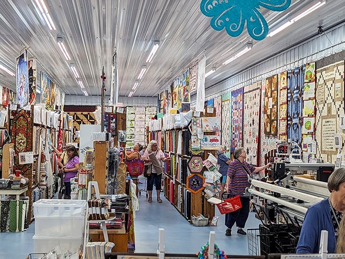 Fabric hunters in their natural habitat, navigating aisles of possibility. This isn't shopping &ndash; it's a textile safari where the perfect pattern is the ultimate prize.