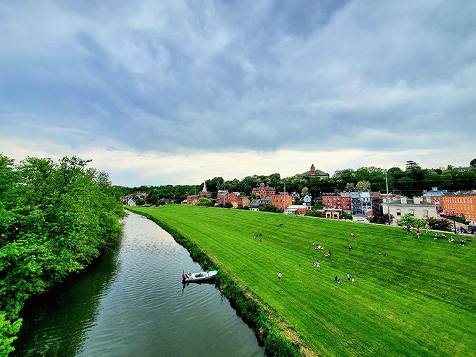 The emerald riverbank and historic downtown create Galena's signature postcard view&mdash;proof that Illinois secretly harbors hills when nobody's looking.