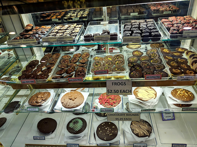 Chocolate rounds lined up like edible poker chips, except in this game, everyone's a winner. That green swirl is practically winking at you.