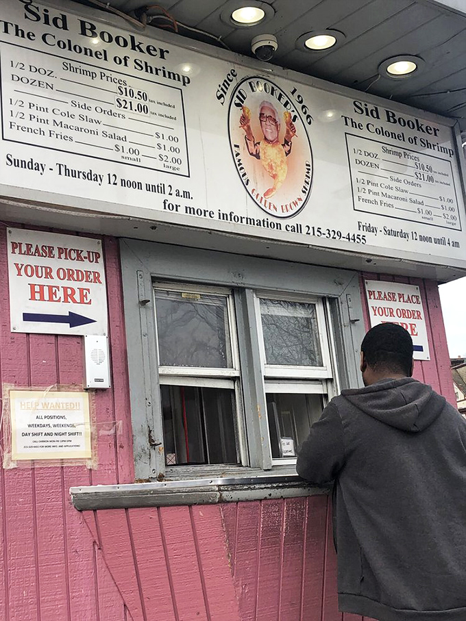 The ordering window: where dreams are placed and shrimp dreams are fulfilled. No frills, no fuss, just direct access to seafood bliss.