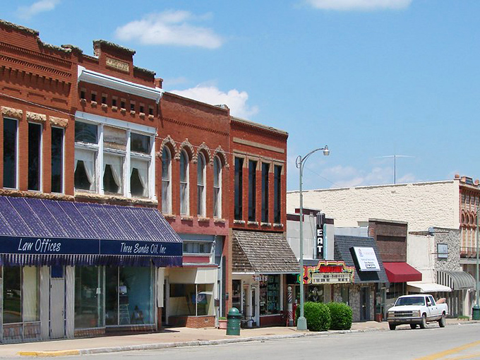 Downtown Perry's historic brick facades tell stories of boom times and resilience, standing proudly as if posing for a Norman Rockwell painting.