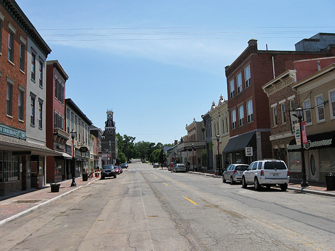 Broadway stretches before you like a living timeline, where historic brick buildings stand shoulder to shoulder under clear Ohio skies.