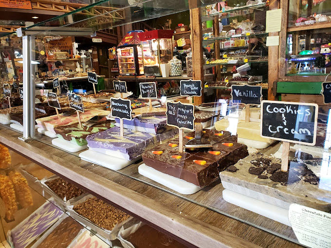 A rainbow of homemade fudge tempts visitors with flavors from classic vanilla to adventurous amaretto swirl. Each creamy square is a sweet testament to the art of confectionery.