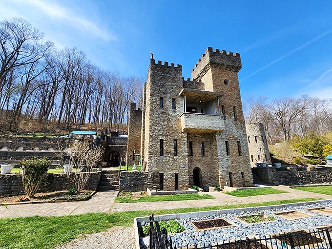Winter reveals the castle's impressive silhouette against bare trees. Those towers weren't built by construction crews but by one man's determination and thousands of hand-placed stones.