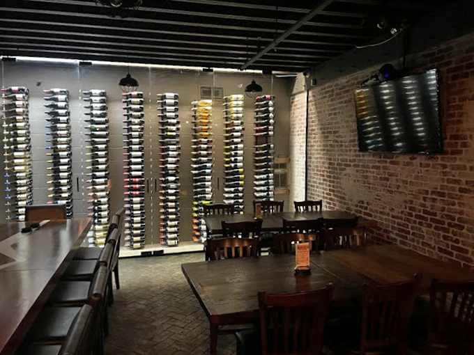 Wine bottles line the wall like trophies of good taste, while exposed brick whispers stories of the building's history to diners settling in for seafood feasts.