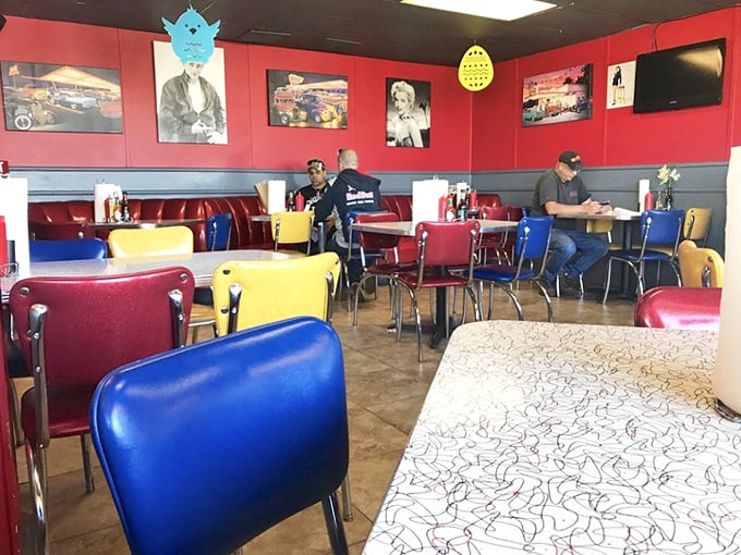 Classic Americana comes to life inside with multi-colored vintage chairs and diner decor that would make the Fonz feel right at home.