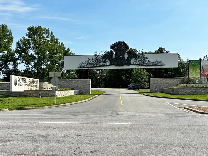 The iconic entrance to Powell Gardens welcomes visitors with its striking wheat sheaf sculpture—nature's version of a red carpet.