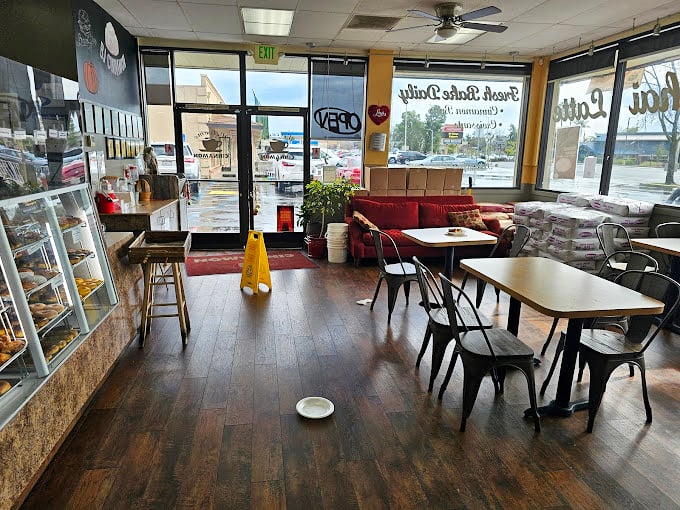 Some bakeries aim for Instagram glamour; BJ Cinnamon prefers comfort with its practical seating area and red couch that says, "Stay awhile, sugar rush incoming."