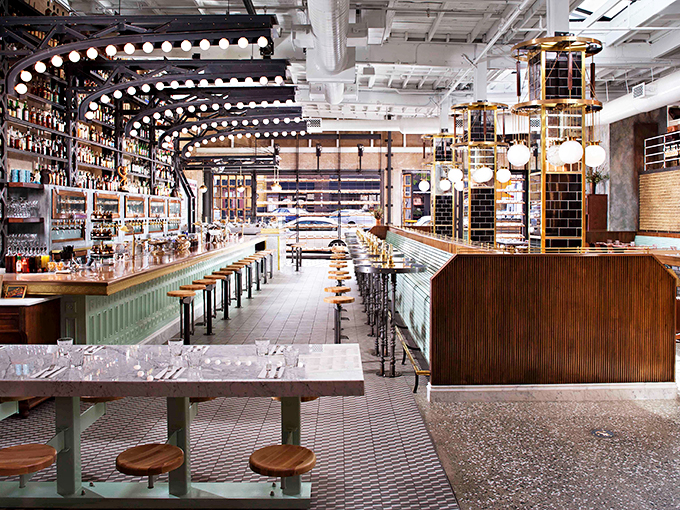 Industrial-chic meets maritime elegance in Ironside's interior, where string lights create the ambiance of dining under a starry harbor sky.