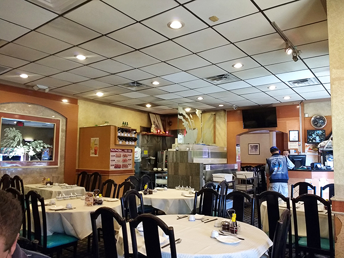 Inside, simple tables and chairs await diners who know that extraordinary seafood needs no fancy setting to shine.