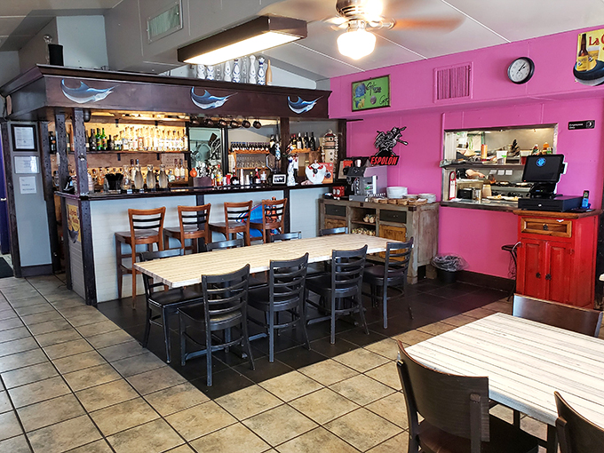 Pink walls and wooden tables create an unpretentious backdrop where the real stars are the oceanic delights coming from the kitchen.