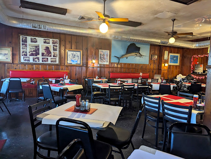 Wood paneling, mounted fish, and red booths create that perfect "been-here-forever" atmosphere where calories don't count and seafood memories are made.