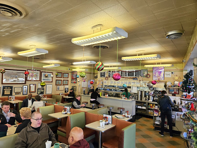 Christmas ornaments hang year-round inside this Atlanta institution, where the booths have witnessed decades of conversations and countless coffee refills.