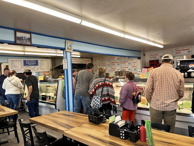 Maritime treasures adorn the shelves &ndash; a visual appetizer before the main event. Each trinket tells a coastal story.