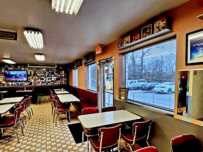 Red vinyl booths and checkerboard floors create the quintessential diner atmosphere where conversations flow as freely as the coffee, a Norman Rockwell painting come to life.