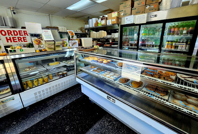 Inside this modest space, treasures await behind glass. Like a museum of deliciousness where every exhibit is edible and worth the pilgrimage.