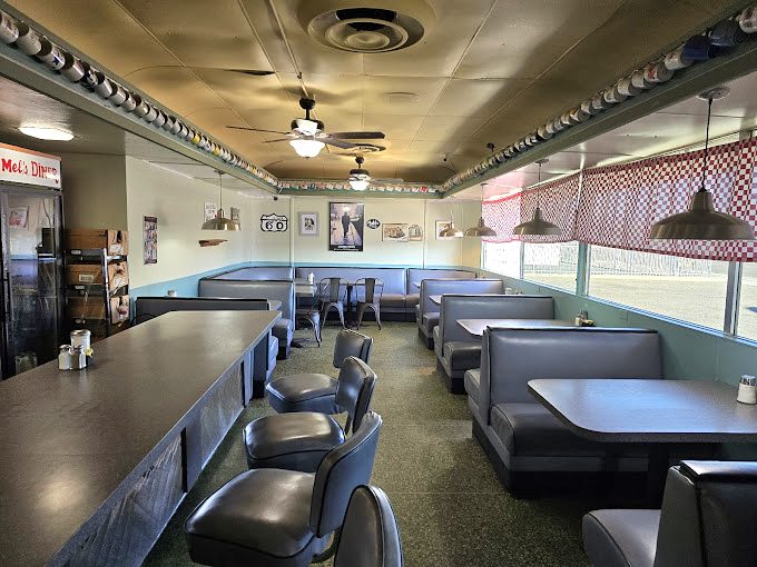 Step inside and you're transported to simpler times &ndash; vinyl booths, counter seating, and that unmistakable diner ambiance that whispers, "Stay awhile, the coffee's always hot."