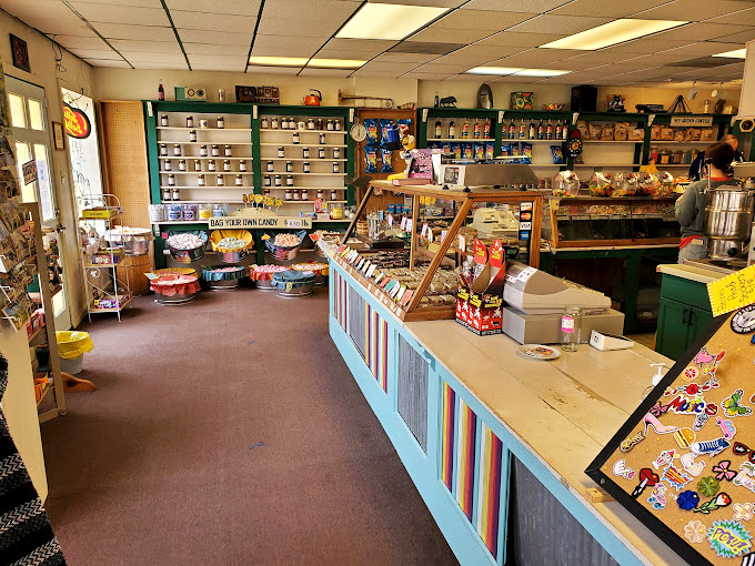 Inside, the pastel-hued counter and carefully arranged jars create what I can only describe as a NASA-level mission control center for sweet tooth satisfaction.