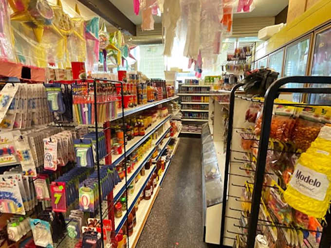 Colorful pi&ntilde;atas hang from the ceiling like festive chandeliers, transforming a simple shopping trip into a visual fiesta that delights before you've eaten a single bite.