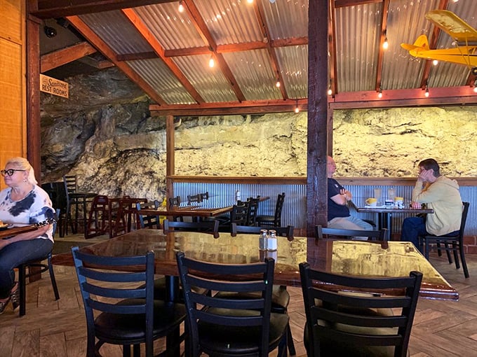 Dining with dinosaurs (well, almost). The ancient limestone walls aren't just decoration&mdash;they're literal millions of years of Earth's history watching over your meal.