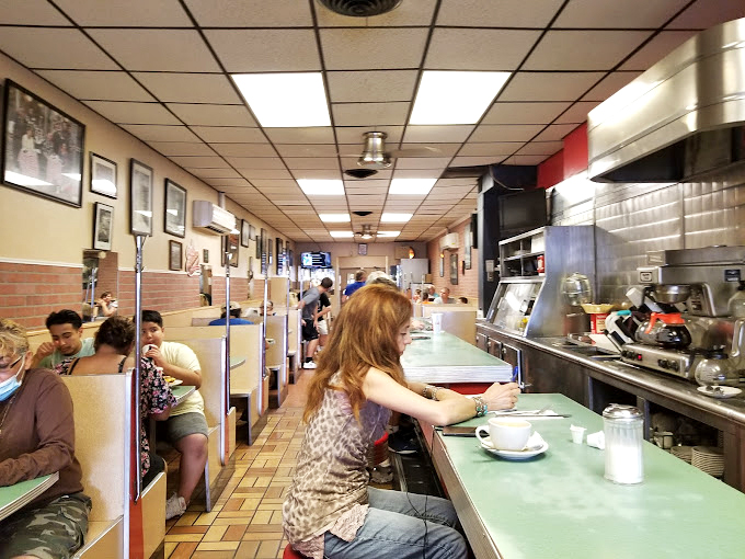 Time travel isn't science fiction&mdash;it's sliding into a booth at G&A, where the mint-green counter and classic diner stools have witnessed decades of Maryland mornings.